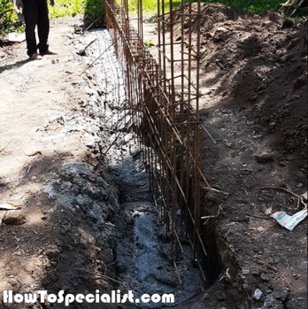 How to Build a Concrete Fence with Wooden Panels